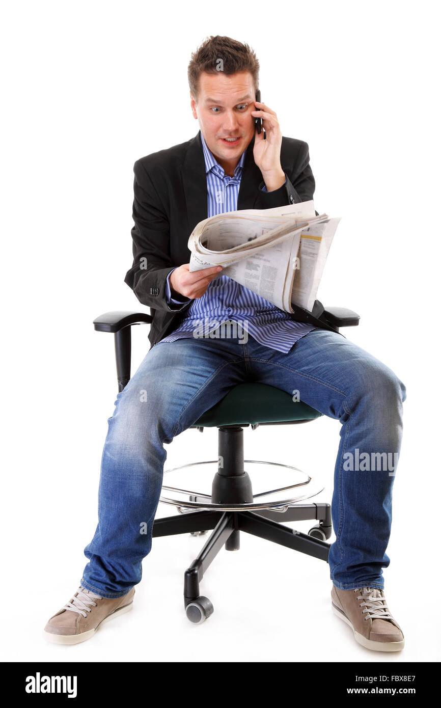Newspaper surprised shock reading hi-res stock photography and images ...