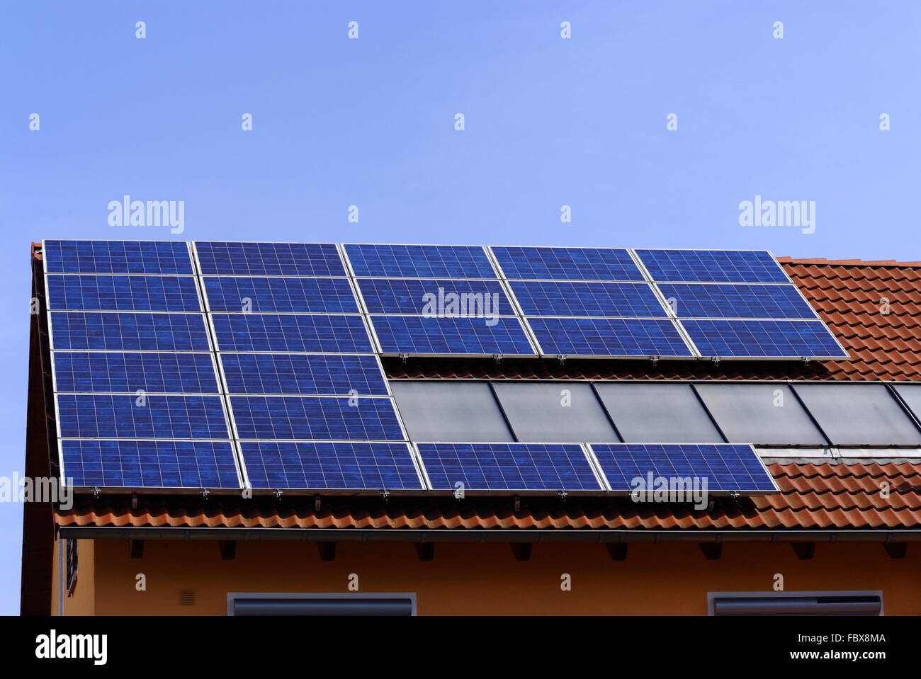 Roof with solar panel surface Stock Photo - Alamy