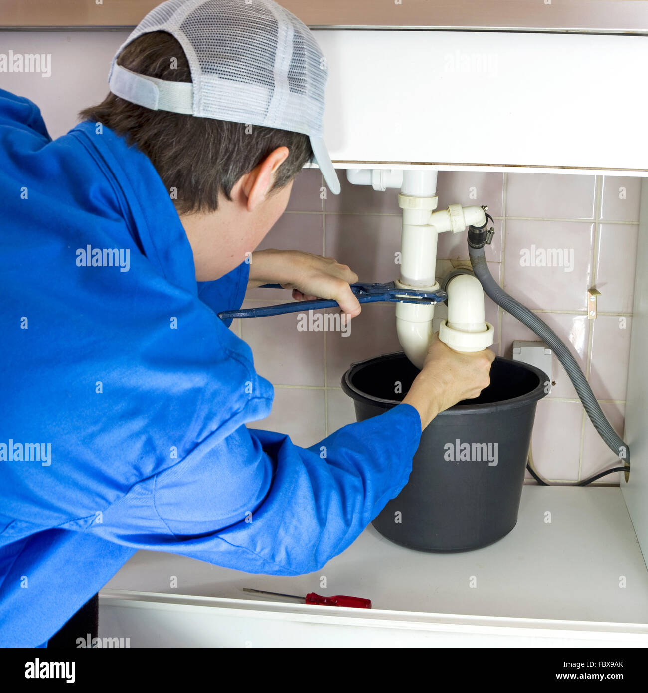 plumber at work Stock Photo - Alamy