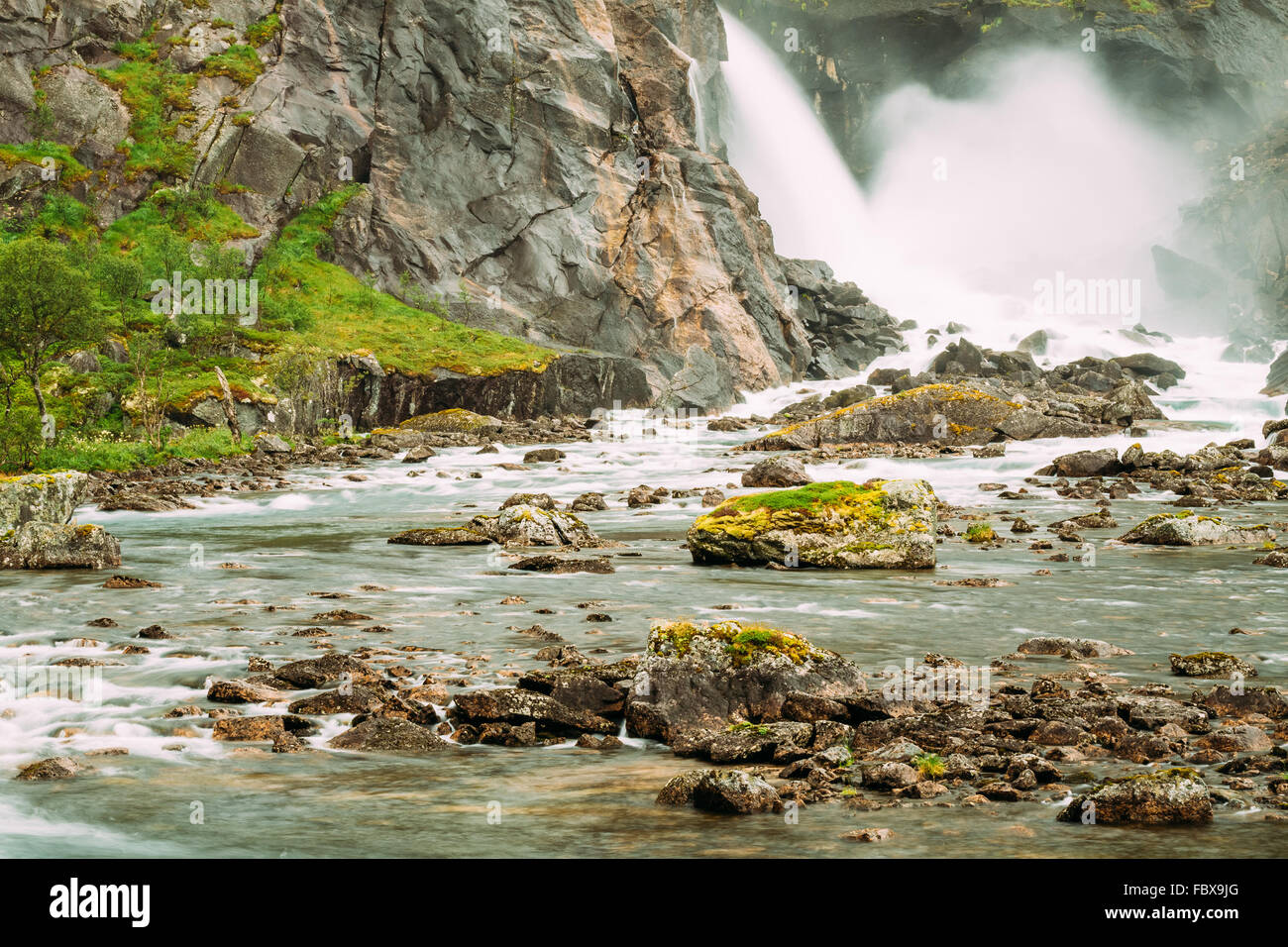 Giant beautiful waterfall in the Valley of waterfalls in Norway ...