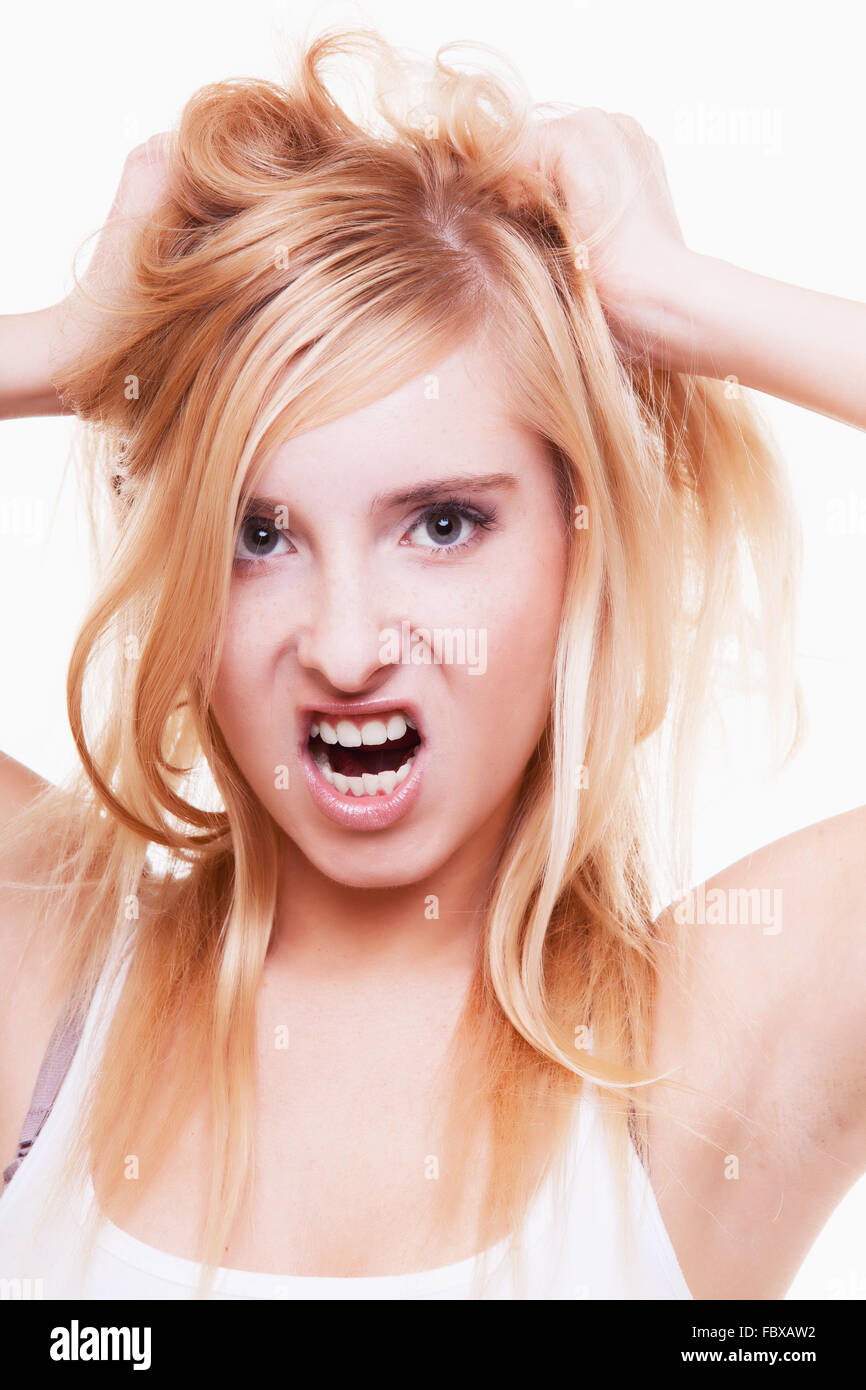 Stressed woman pulling hair hi-res stock photography and images - Alamy