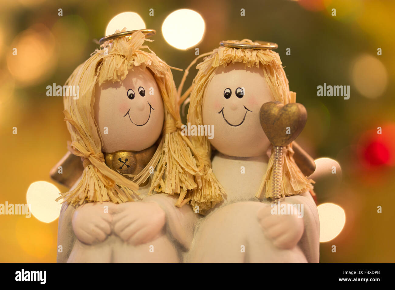 Two sitting angels hi-res stock photography and images - Alamy