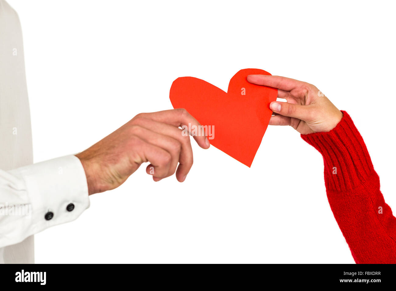 Couple hands holding heart shaped paper Stock Photo - Alamy
