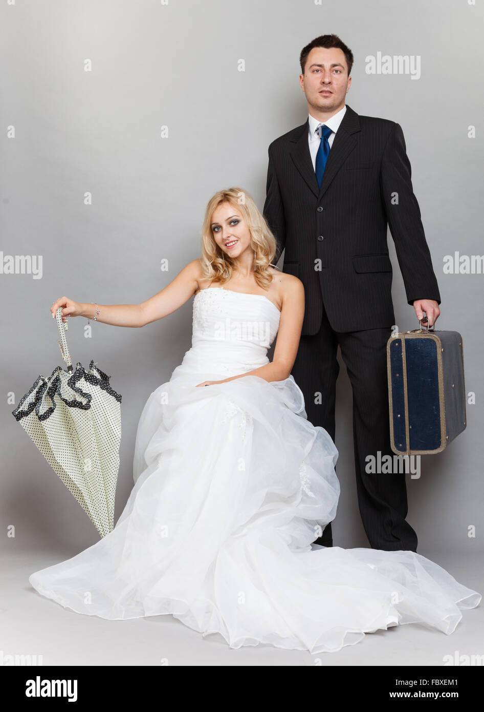 Retro married couple bride and groom studio shot Stock Photo - Alamy
