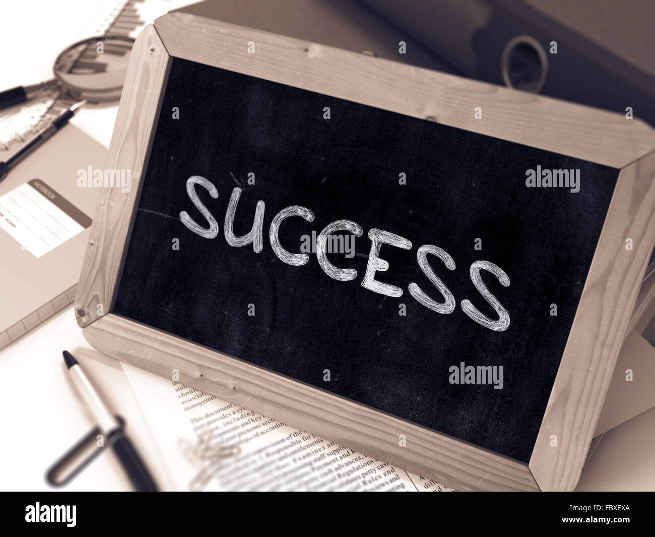 Success Handwritten by White Chalk on a Blackboard Stock Photo - Alamy