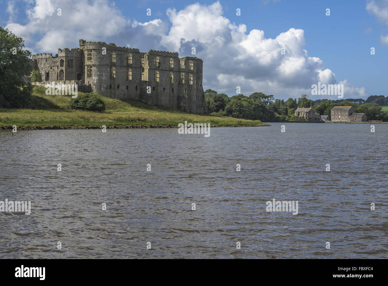 Carew Castle and Carew Tidal Mill Stock Photo - Alamy