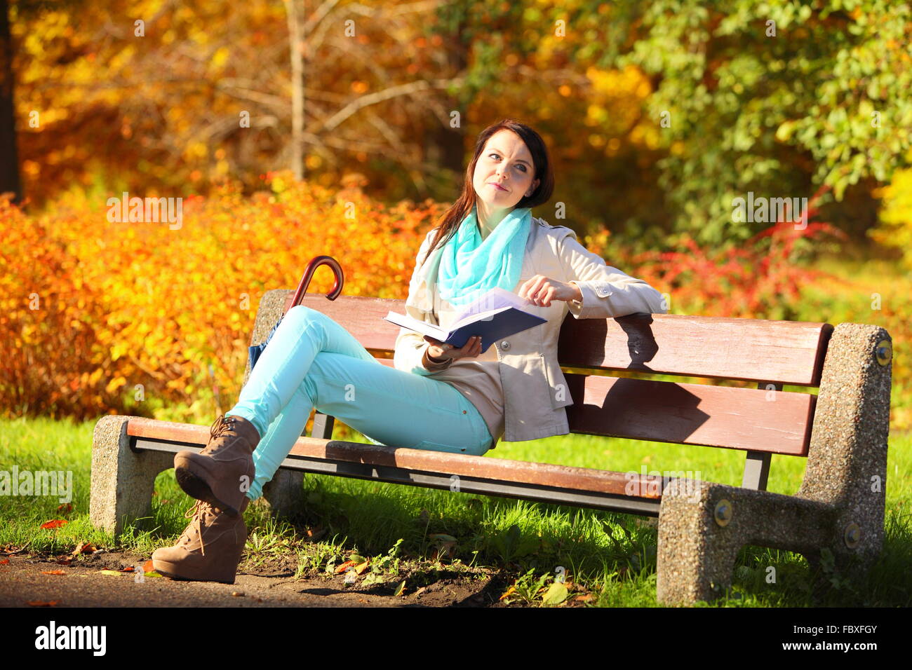 Happy teenager book outdoors hi-res stock photography and images - Alamy