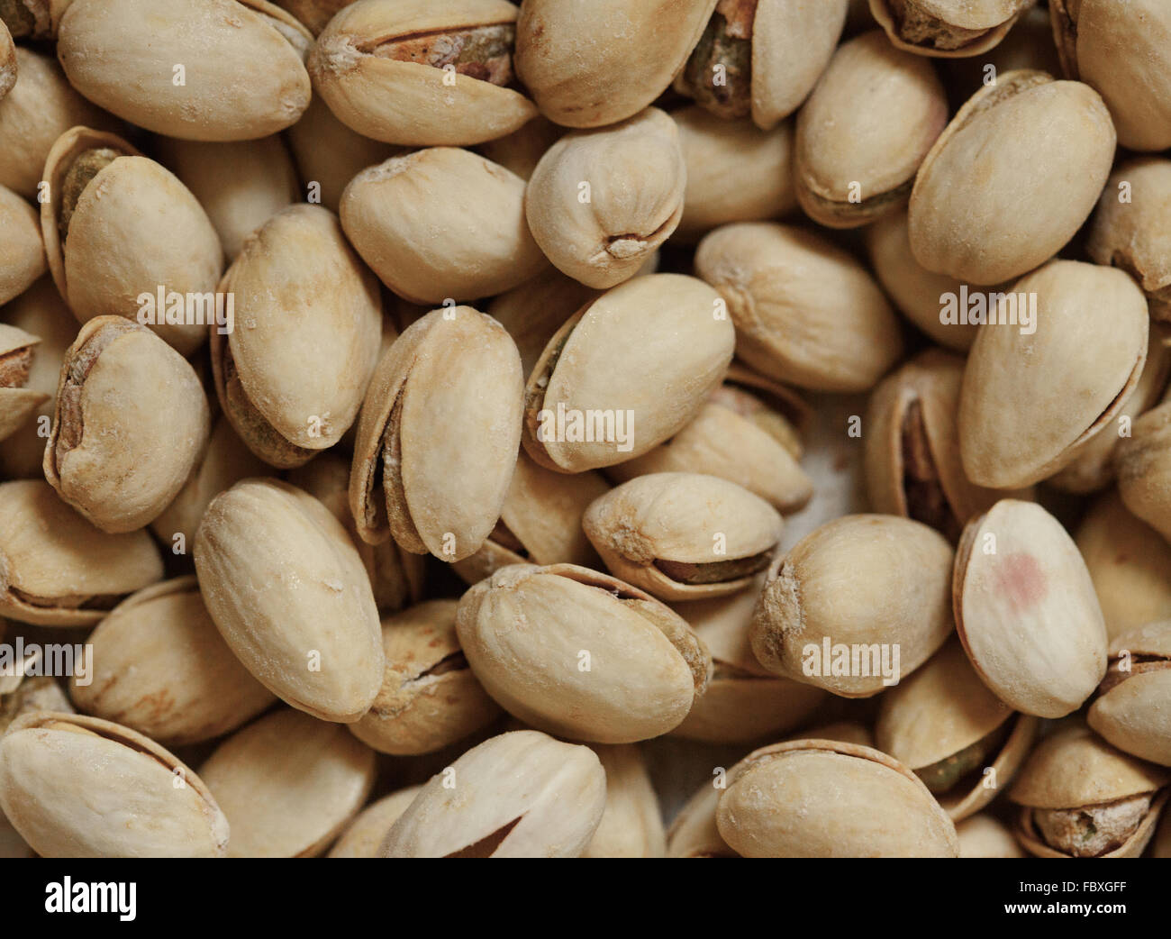 Closeup of pistachios in nut shells as food background Stock Photo - Alamy