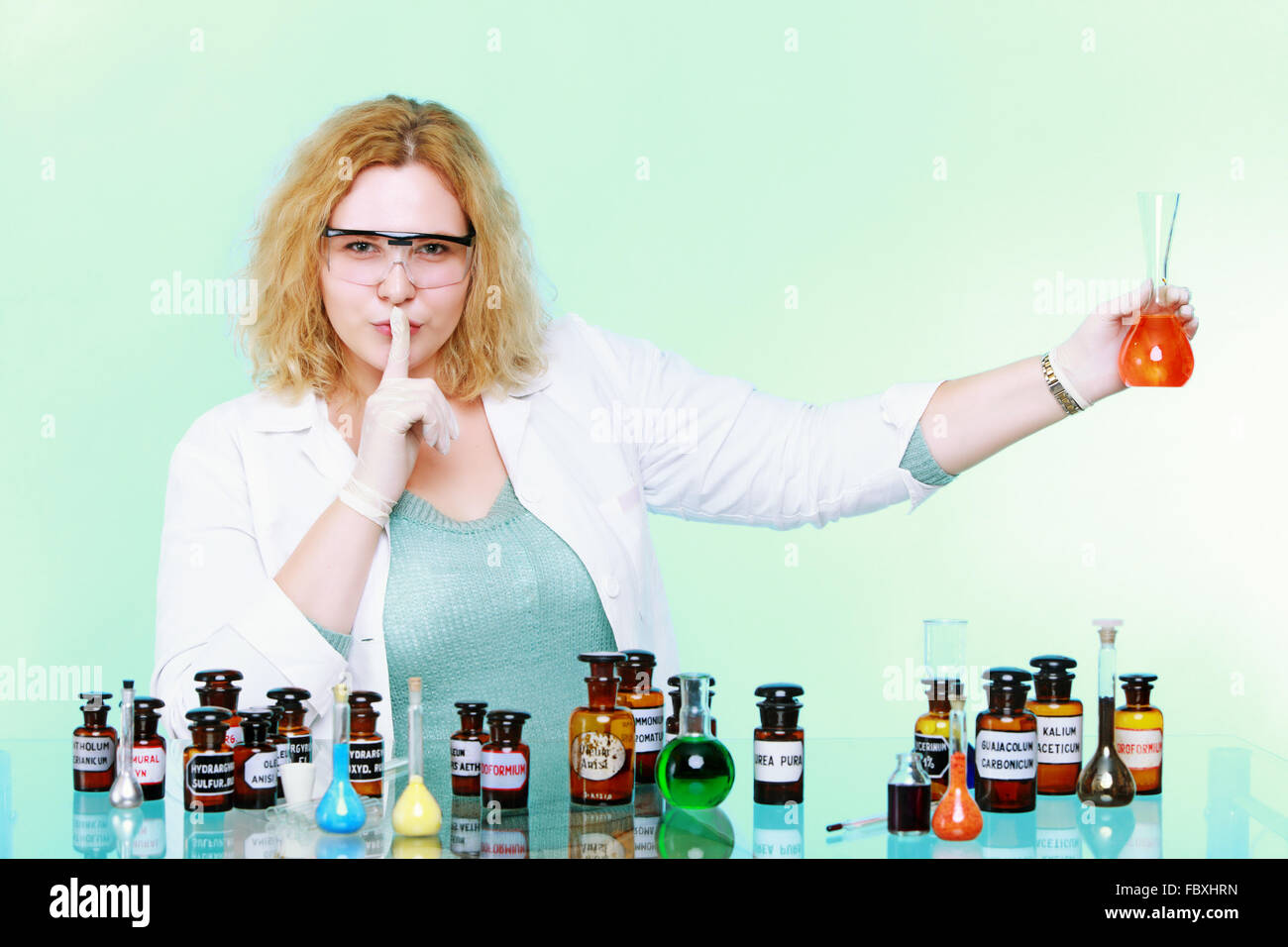 Chemical lab flask woman hi-res stock photography and images - Alamy