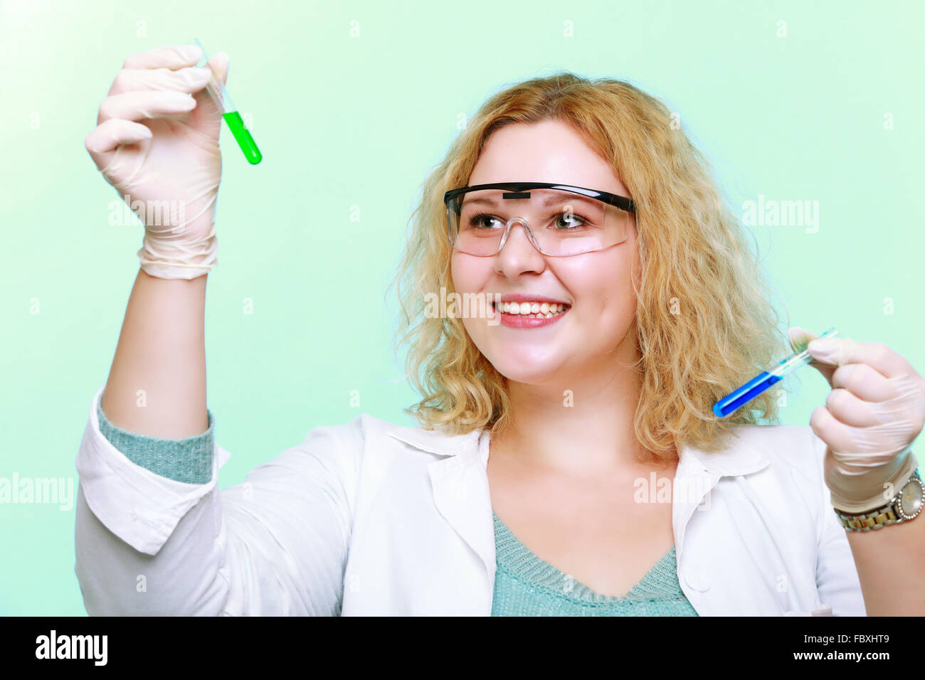 Female doctor lab test tubes hi-res stock photography and images - Alamy
