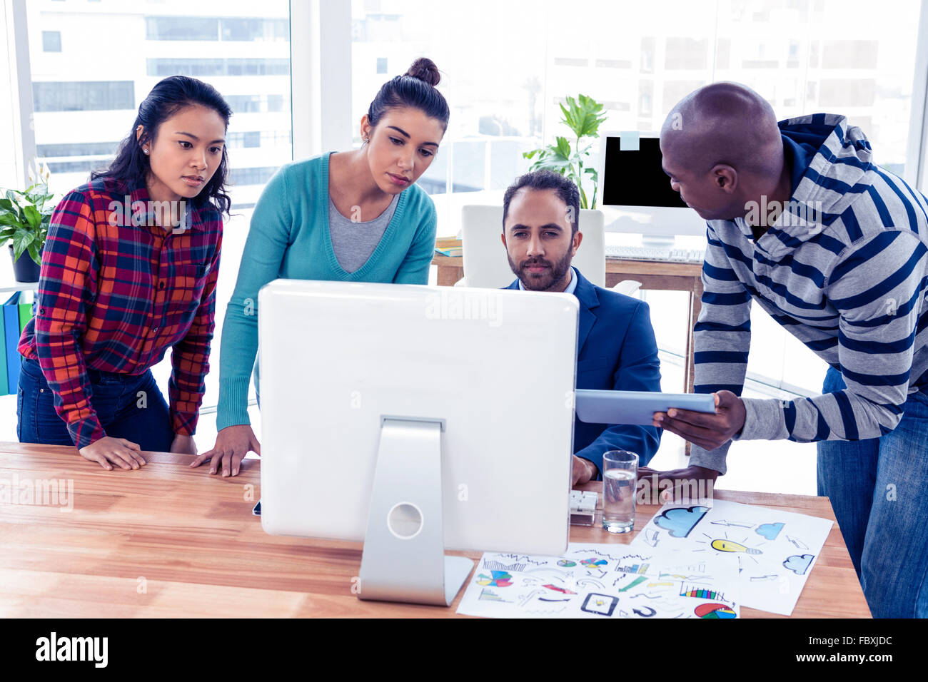High angle view of business people at desk Stock Photo - Alamy