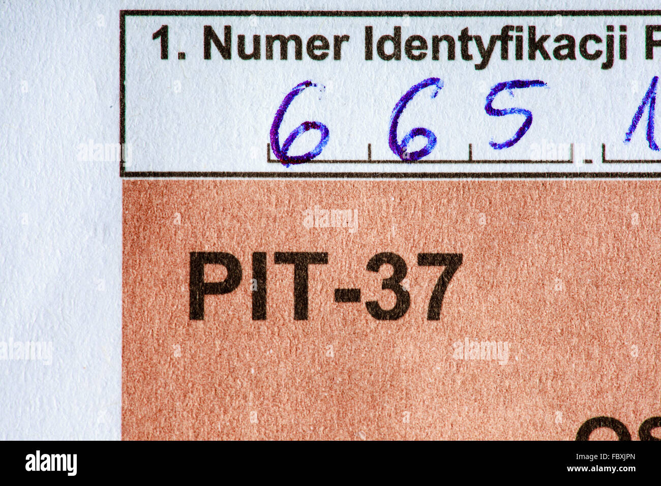 Filling in polish individual tax form PIT-37 for year 2013 Stock Photo ...