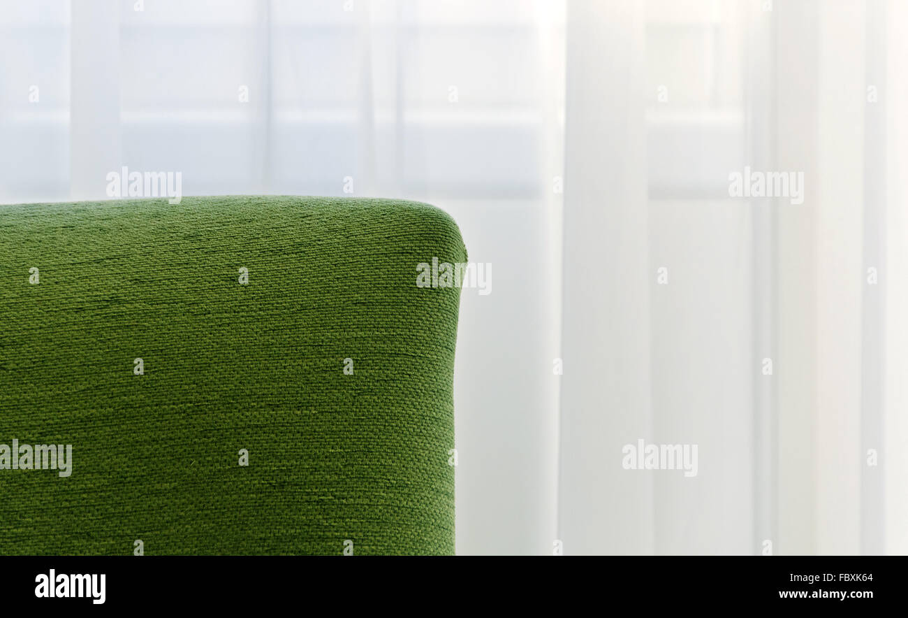 green cushioned chair back Stock Photo - Alamy