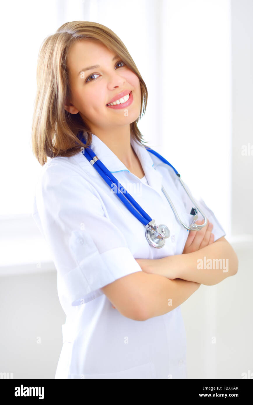 Portrait of a happy female doctor Stock Photo - Alamy