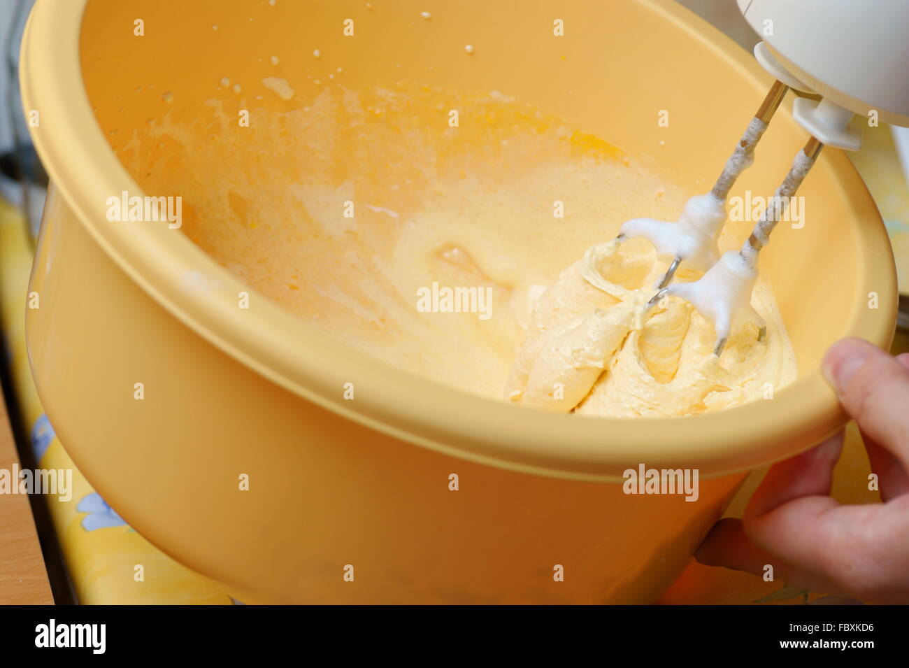 Mixer used to mix baking ingredients in bow Stock Photo - Alamy