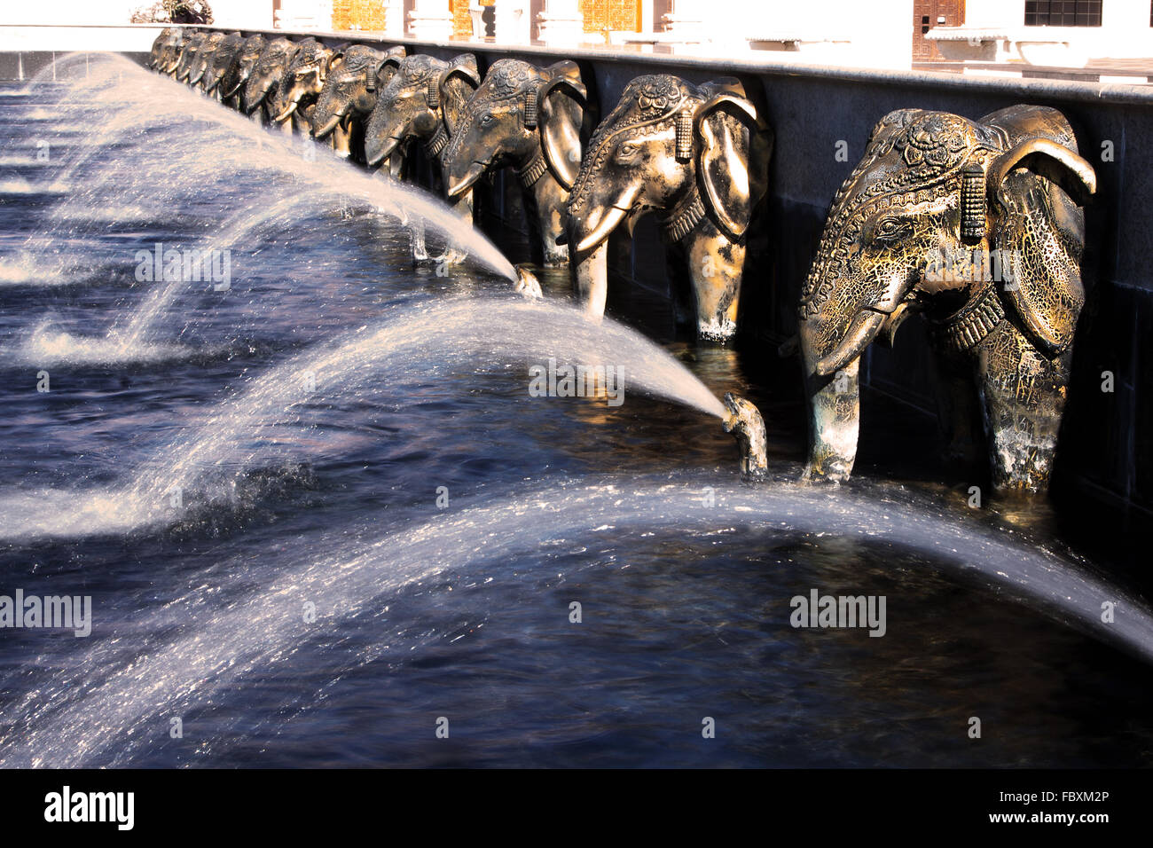 Elephants water fountain at Hindu temple Stock Photo - Alamy