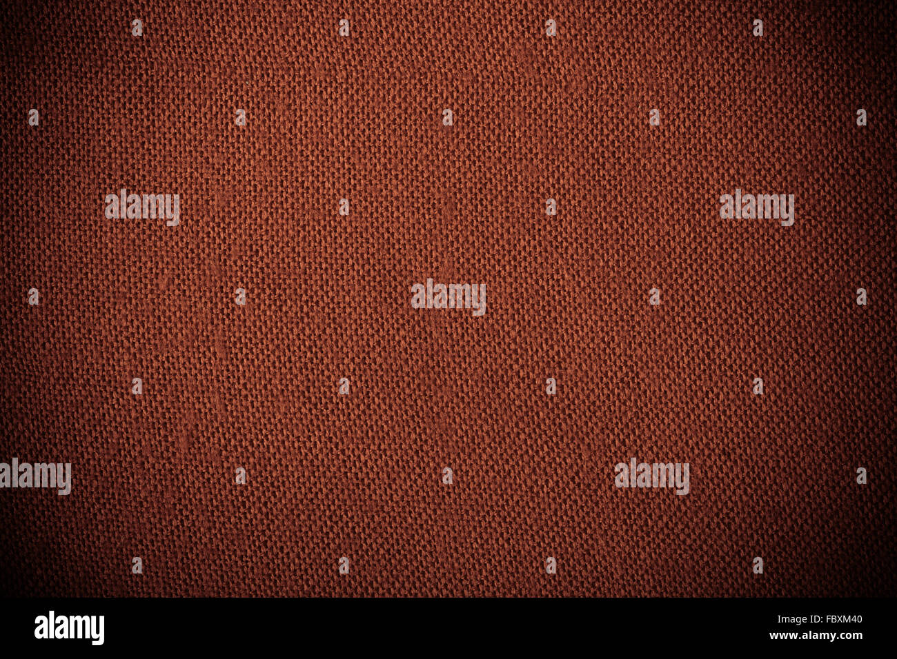 Closeup of red brown fabric textile material as texture background ...