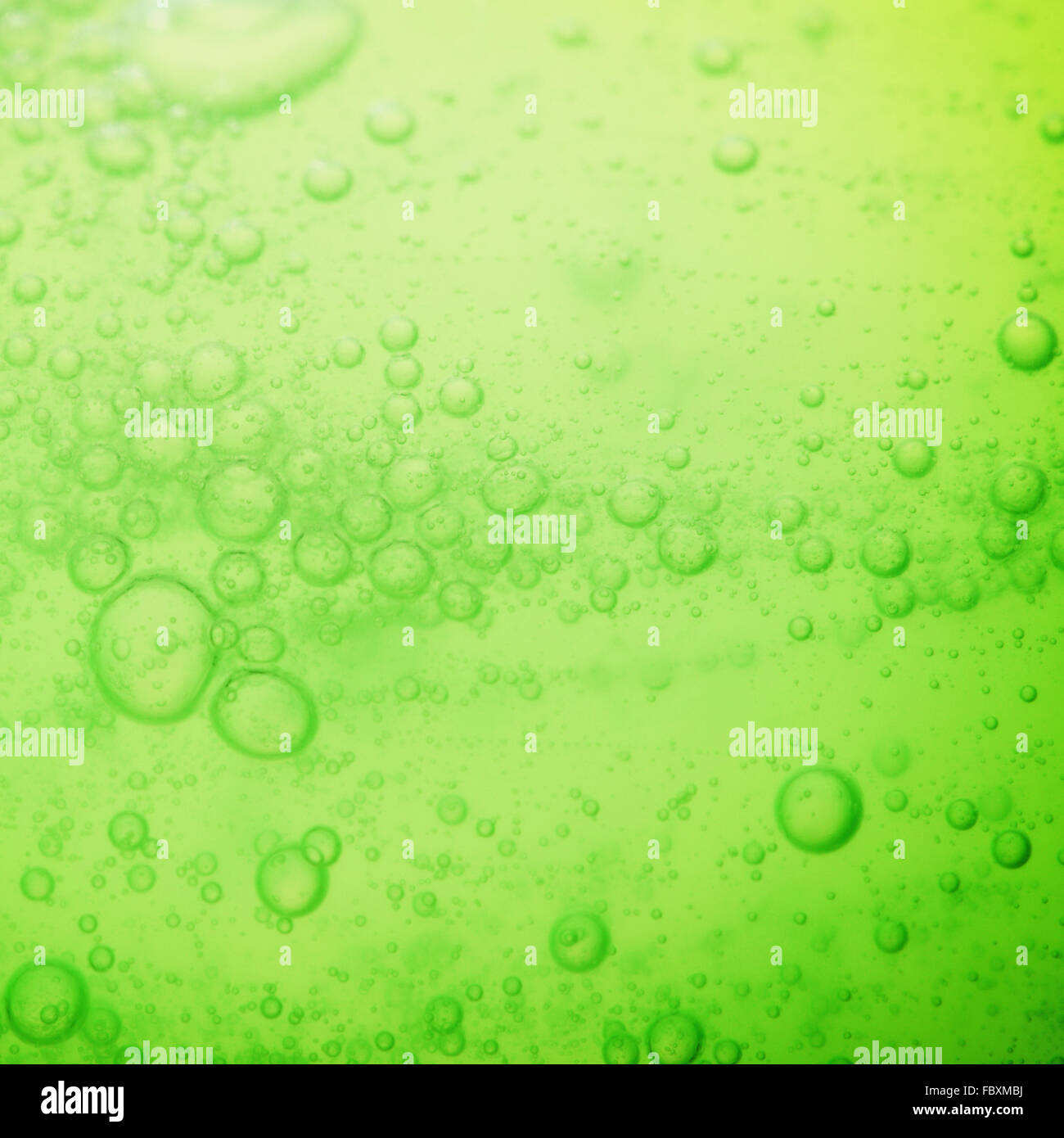 soap bubbles green liquid background Stock Photo - Alamy