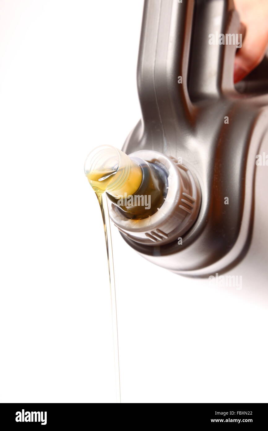 Can with car engine oil pouring isolated Stock Photo - Alamy