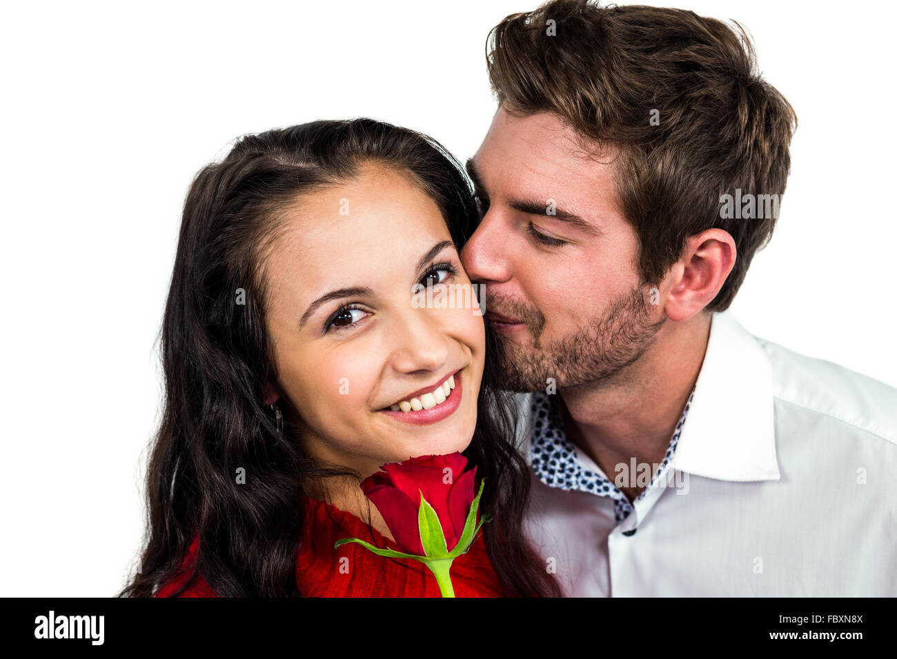 Romantic young couple holding rose hi-res stock photography and images ...