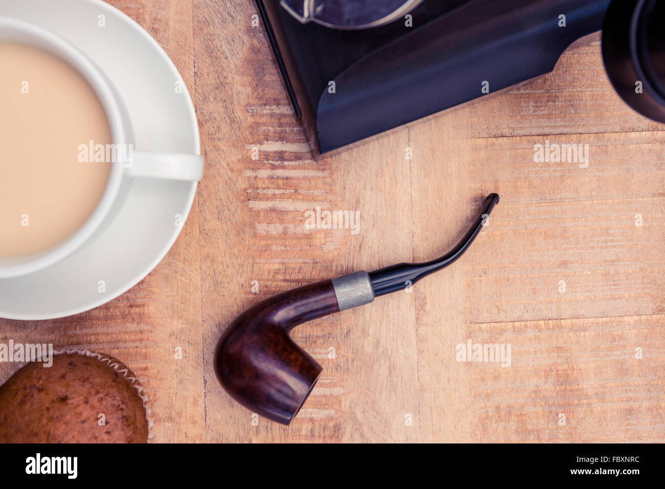 Close-up of coffee and smoking pipe Stock Photo - Alamy