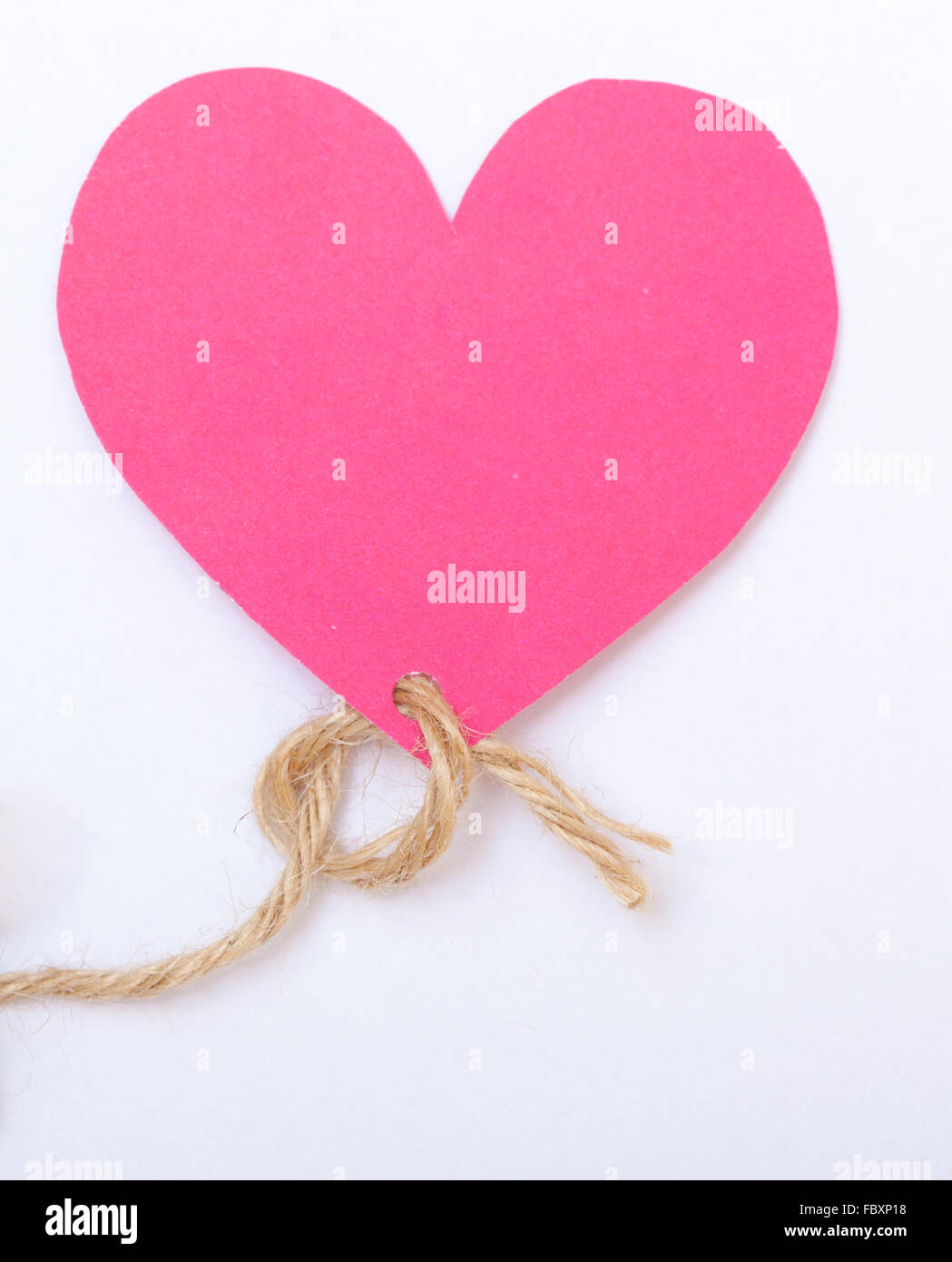 Pink paper heart with string symbol love valentine's day Stock Photo ...