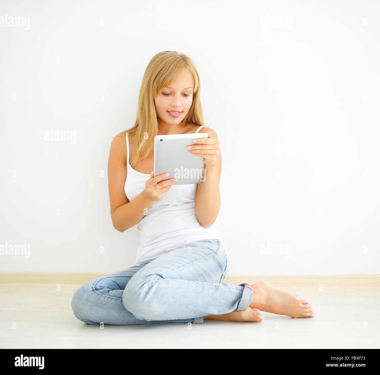 Young attractive girl with tablet pc Stock Photo - Alamy