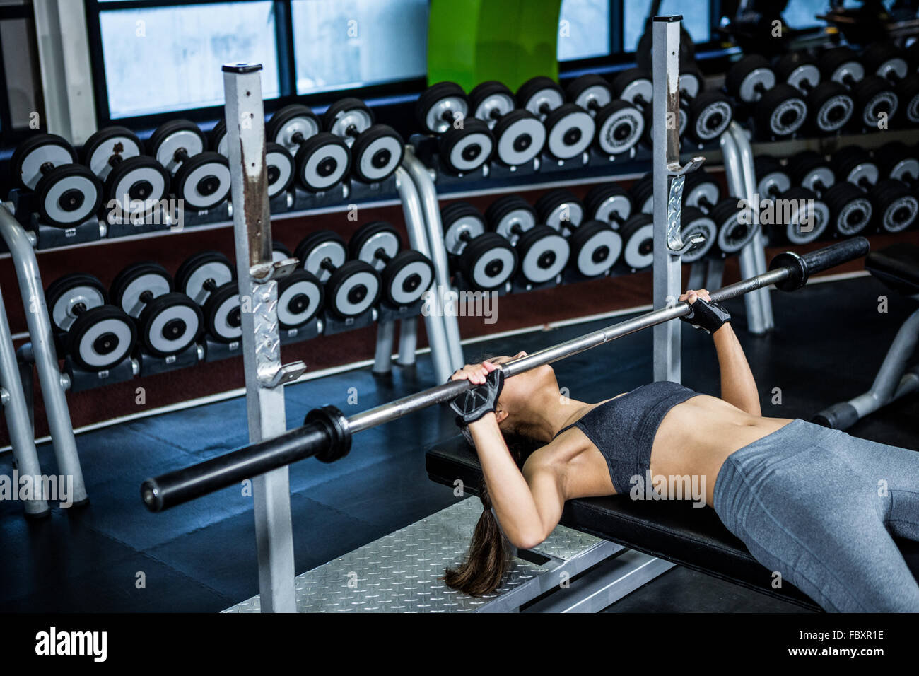 Woman on weightlifting bench hi-res stock photography and images - Alamy
