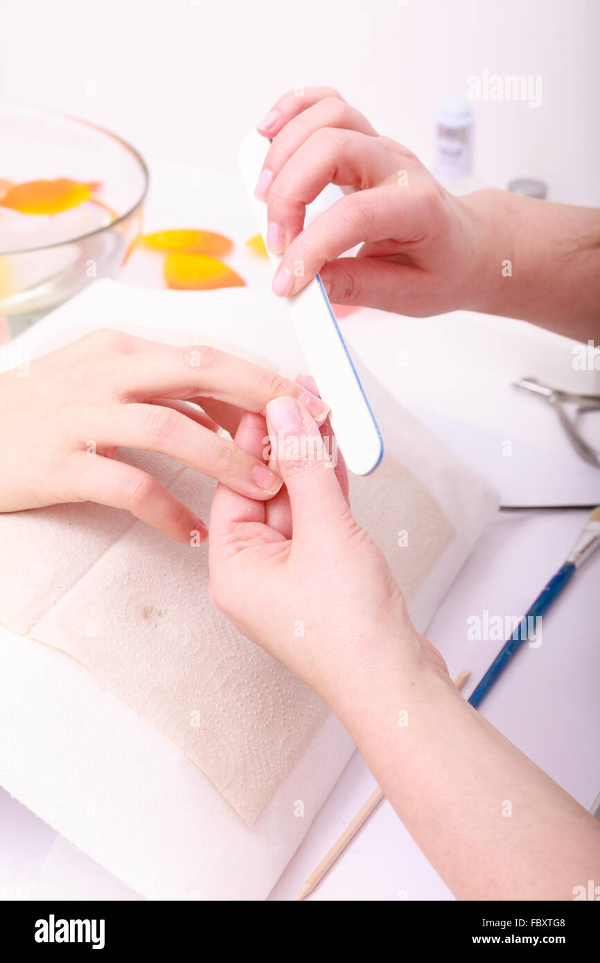 Filing nails hi-res stock photography and images - Alamy