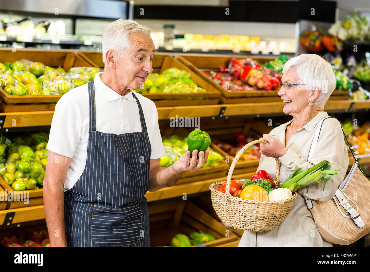 Retired woman working supermarket hi-res stock photography and images ...