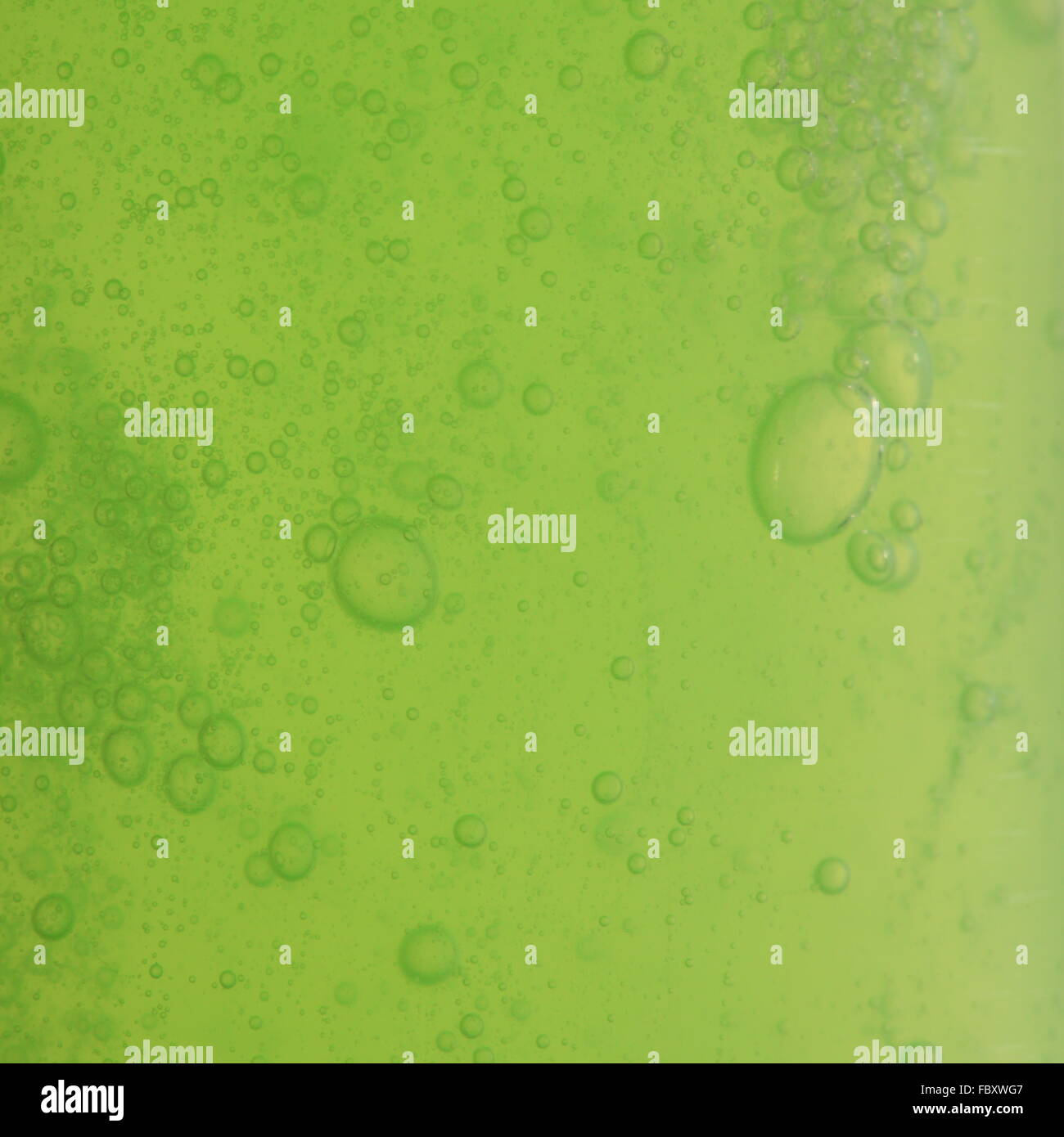 soap bubbles green liquid background Stock Photo - Alamy