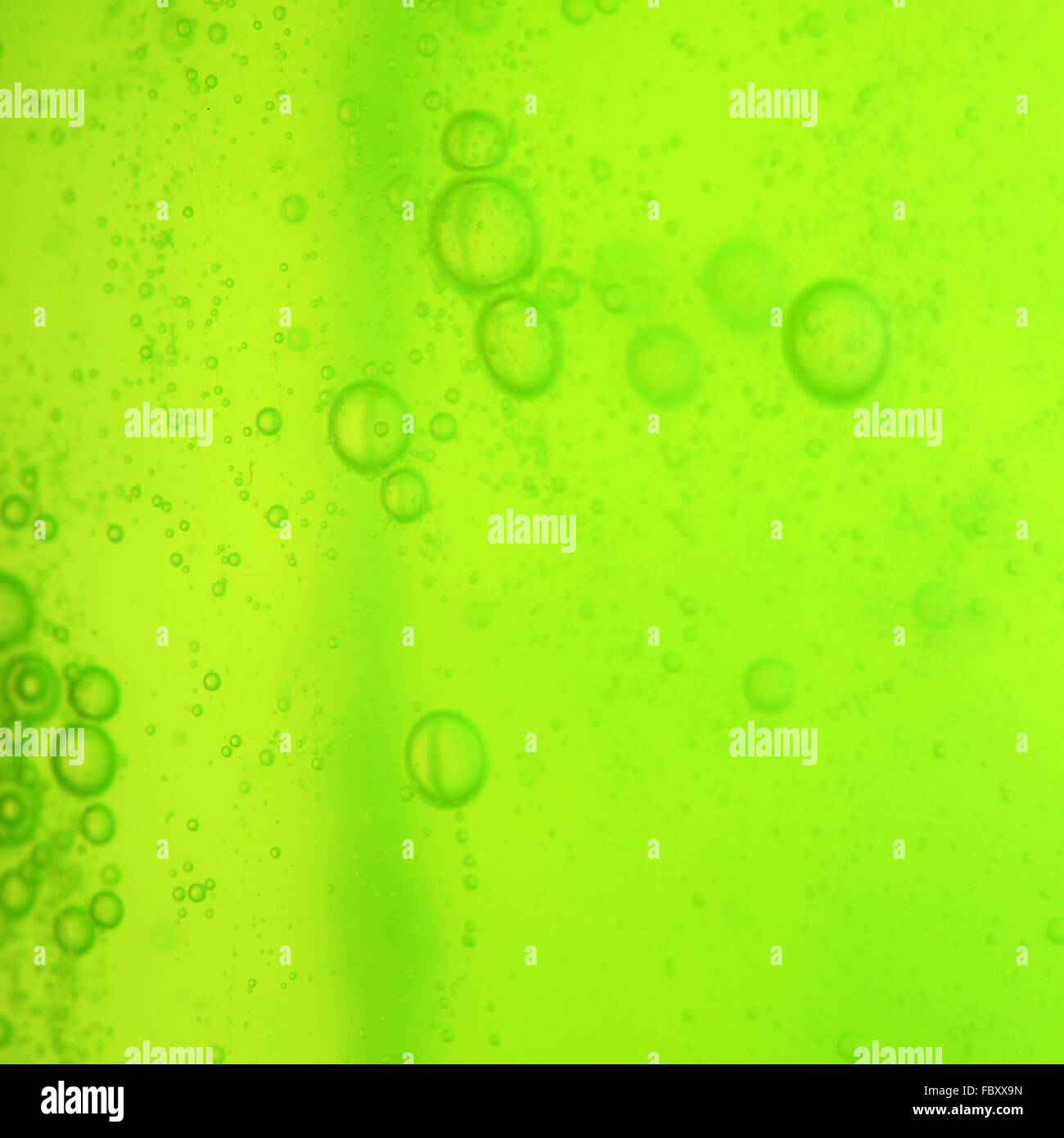 soap bubbles green liquid background Stock Photo - Alamy