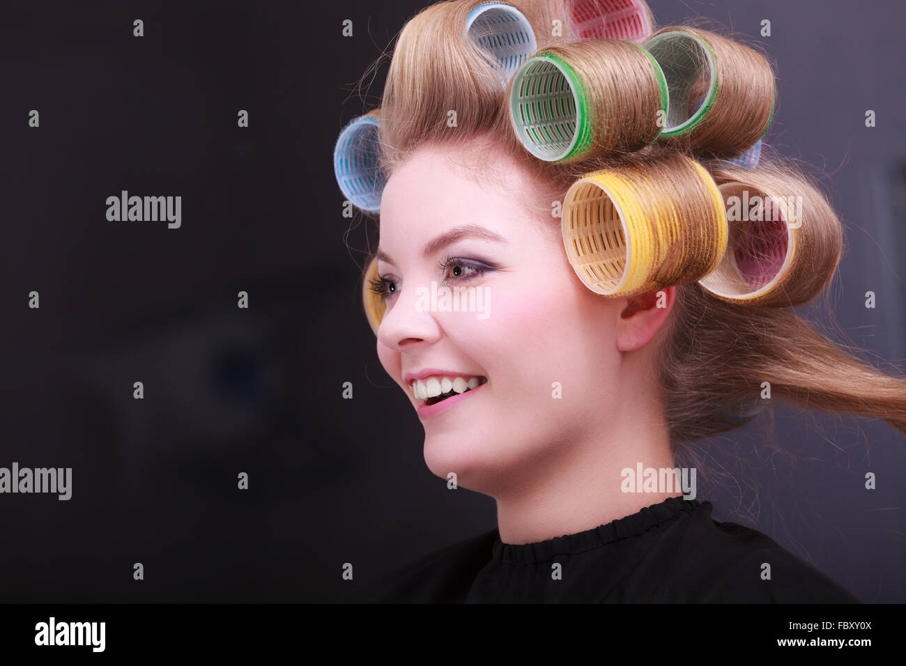 Blond girl hair curlers rollers hi-res stock photography and images - Alamy