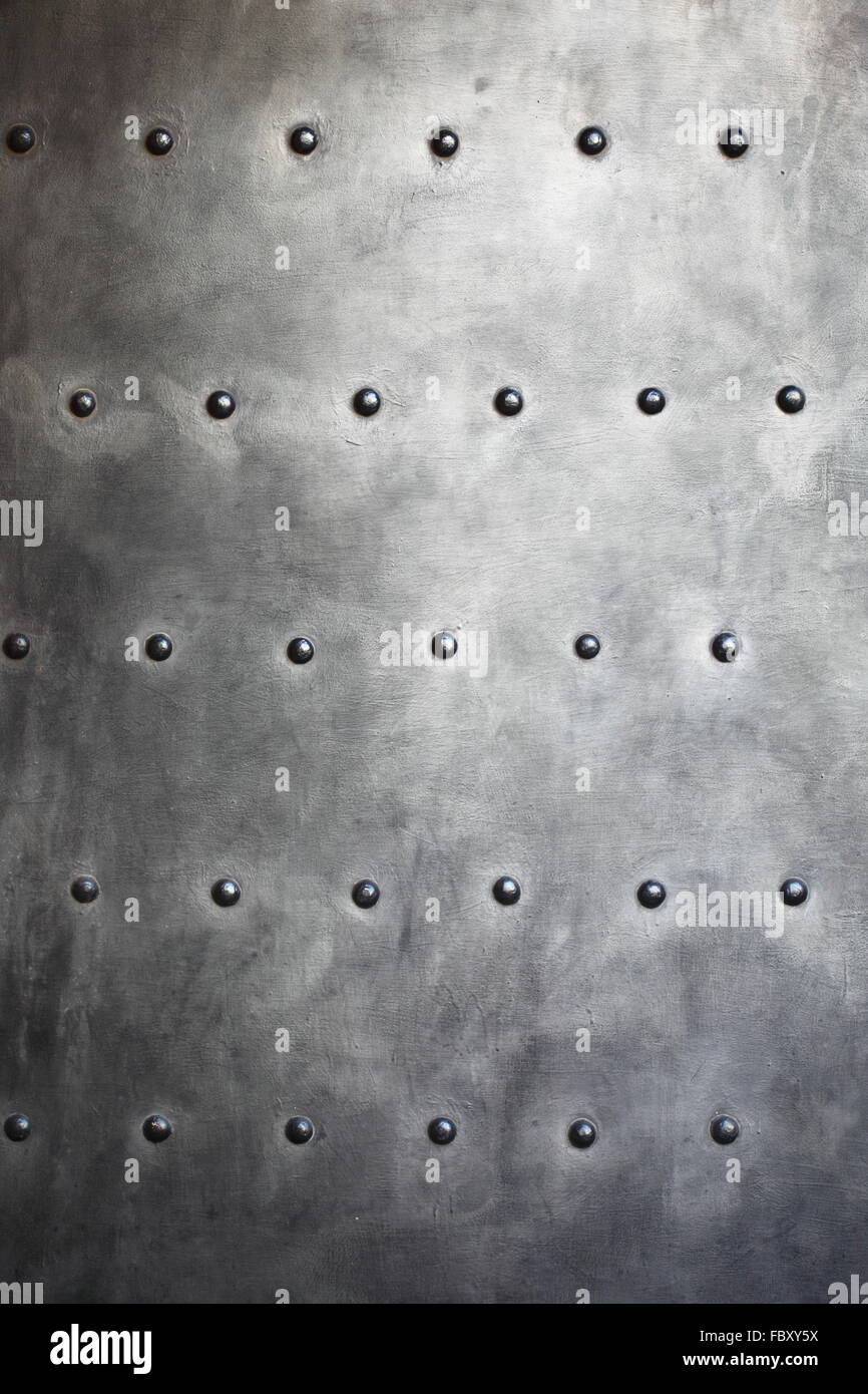Grunge black metal plate rivets hi-res stock photography and images - Alamy