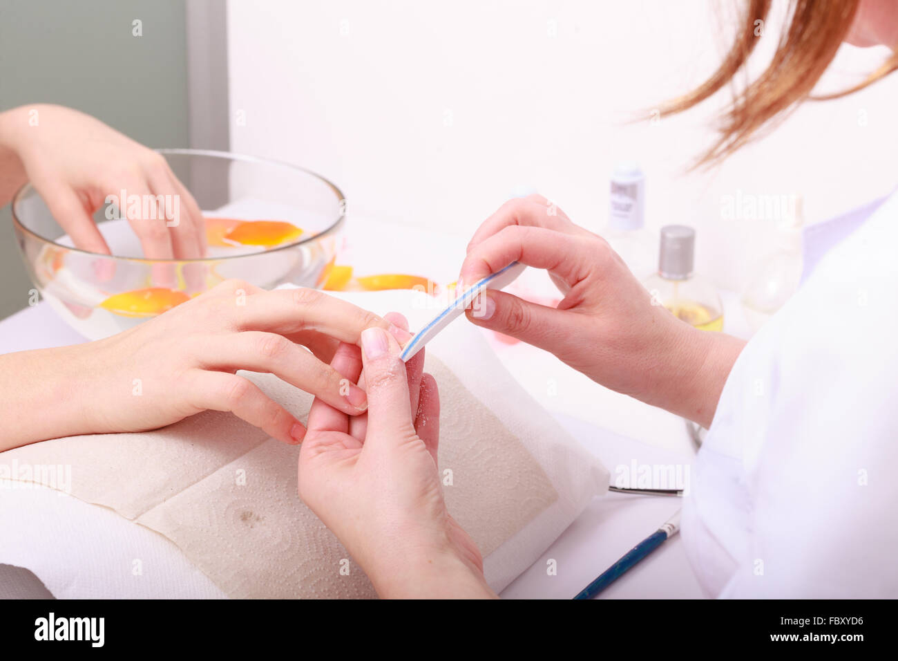 Woman nail filing hi-res stock photography and images - Alamy