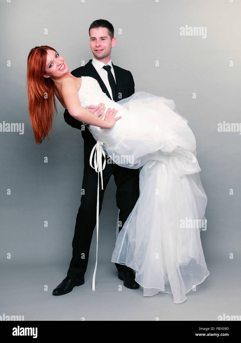 Lifting bride hi-res stock photography and images - Alamy