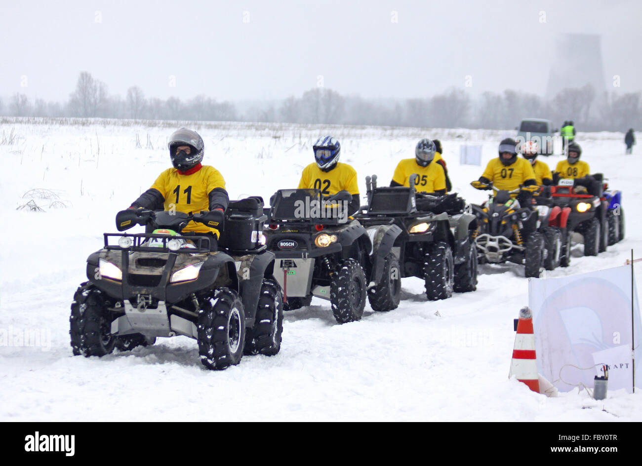 KYIV, UKRAINE - FEBRUARY 13, 2010: Quad bike drivers waiting for the ...