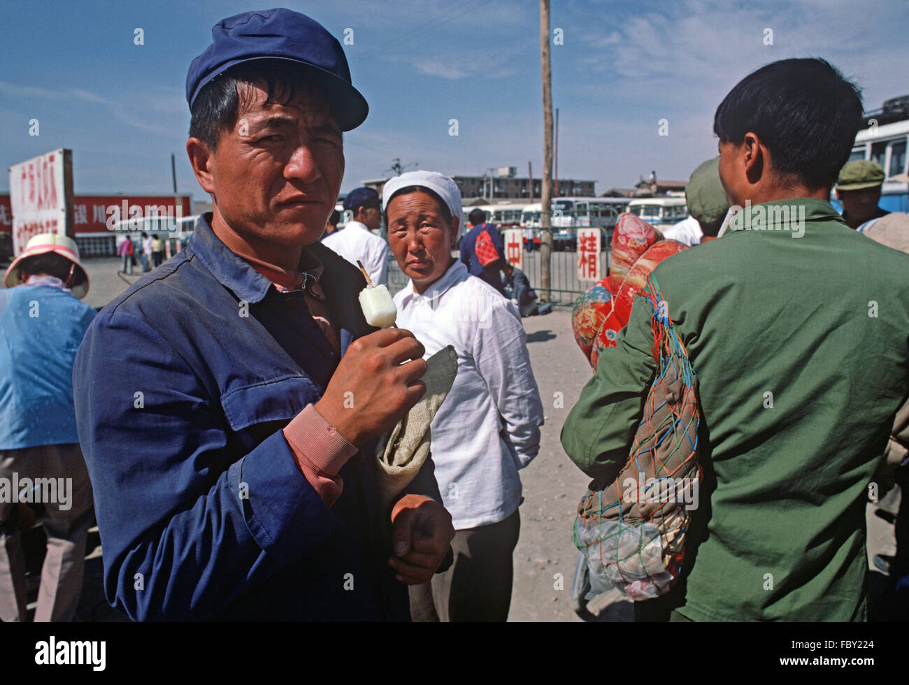 Chinese Muslim woman with onlookers, Yinchuan, Ningxia Autonomous ...