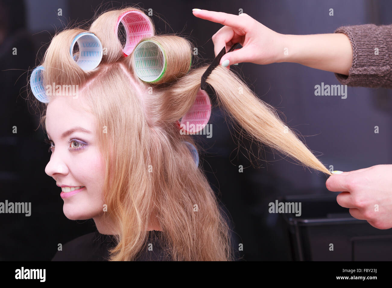 Blond girl hair curlers rollers hi-res stock photography and images - Alamy