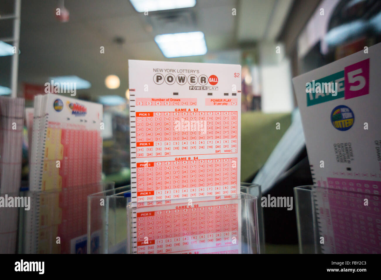 Powerball tickets on a convenience store shelf to enter for an ...