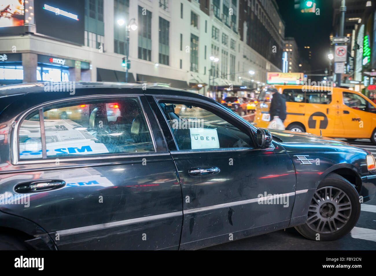 An Uber livery travels through Midtown Manhattan in New York on Tuesday ...