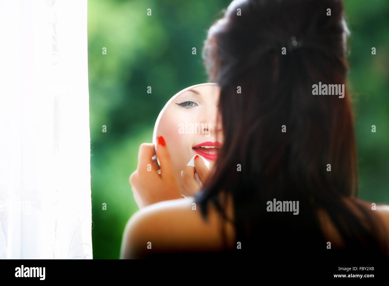 Retro woman mirror lipstick makeup hi-res stock photography and images ...