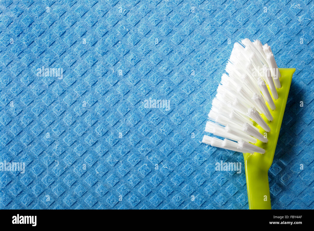 Blue sponge background and brush Stock Photo - Alamy