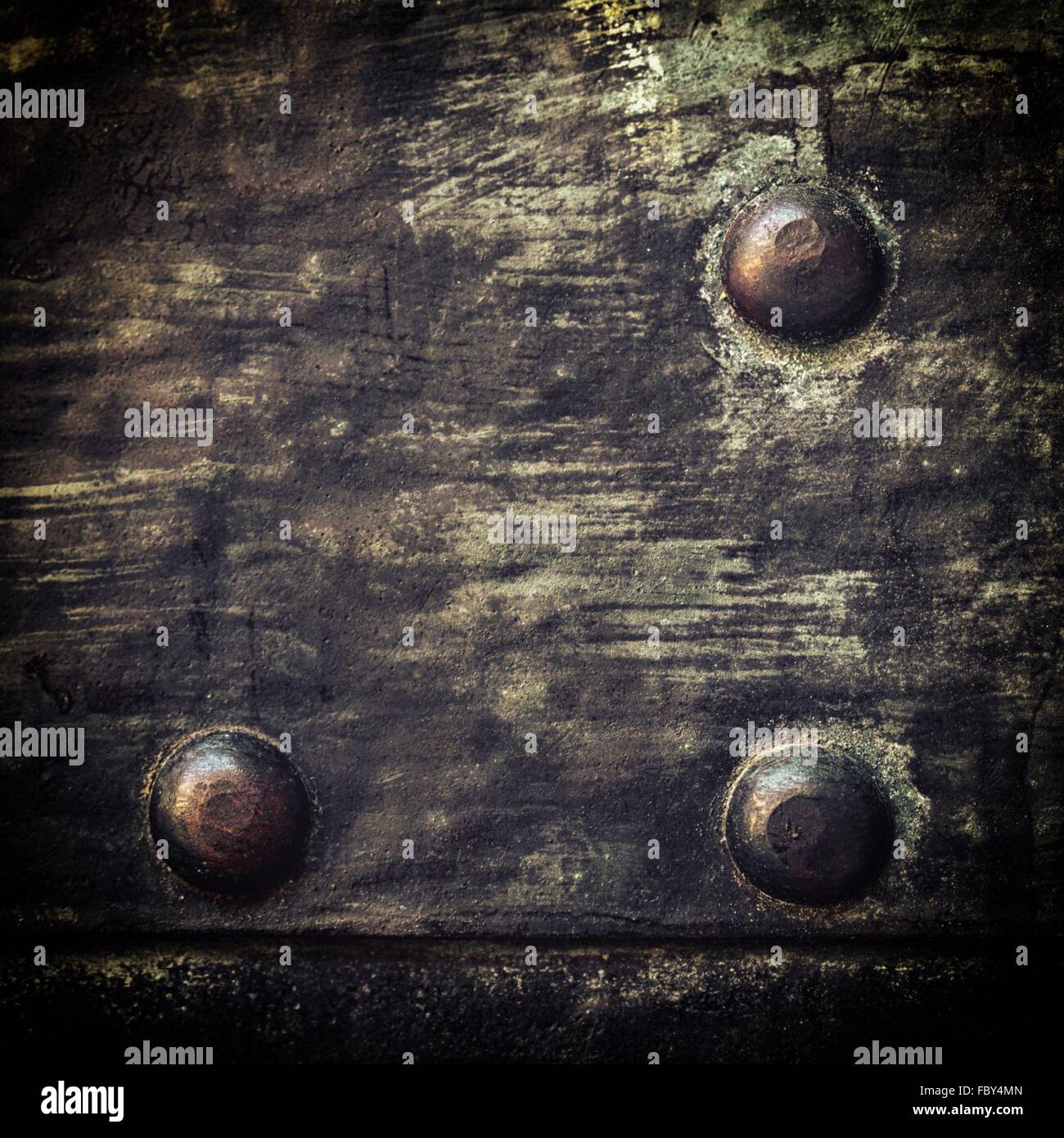 Grunge black metal plate with rivets screws background texture Stock ...