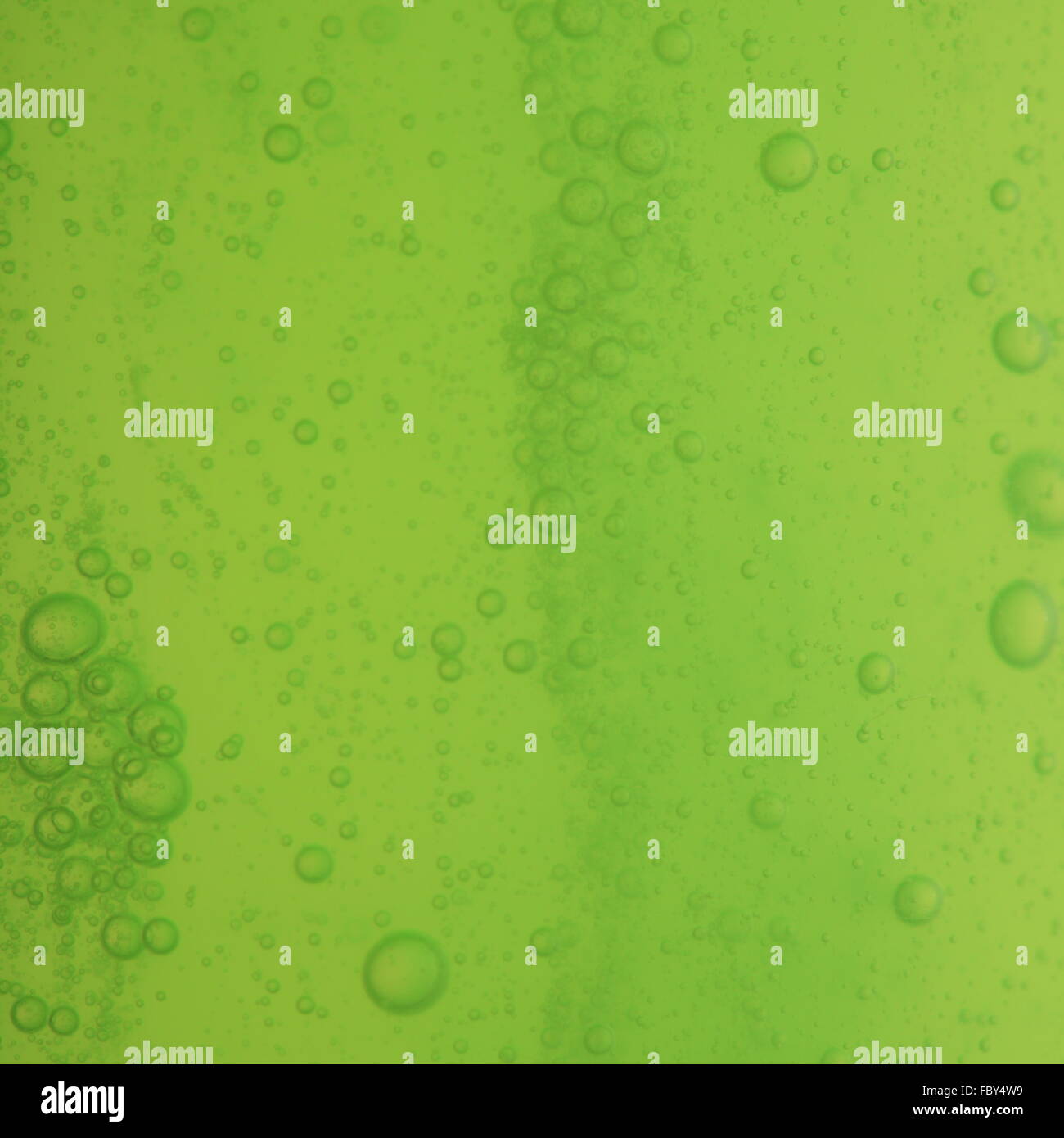 soap bubbles green liquid background Stock Photo - Alamy