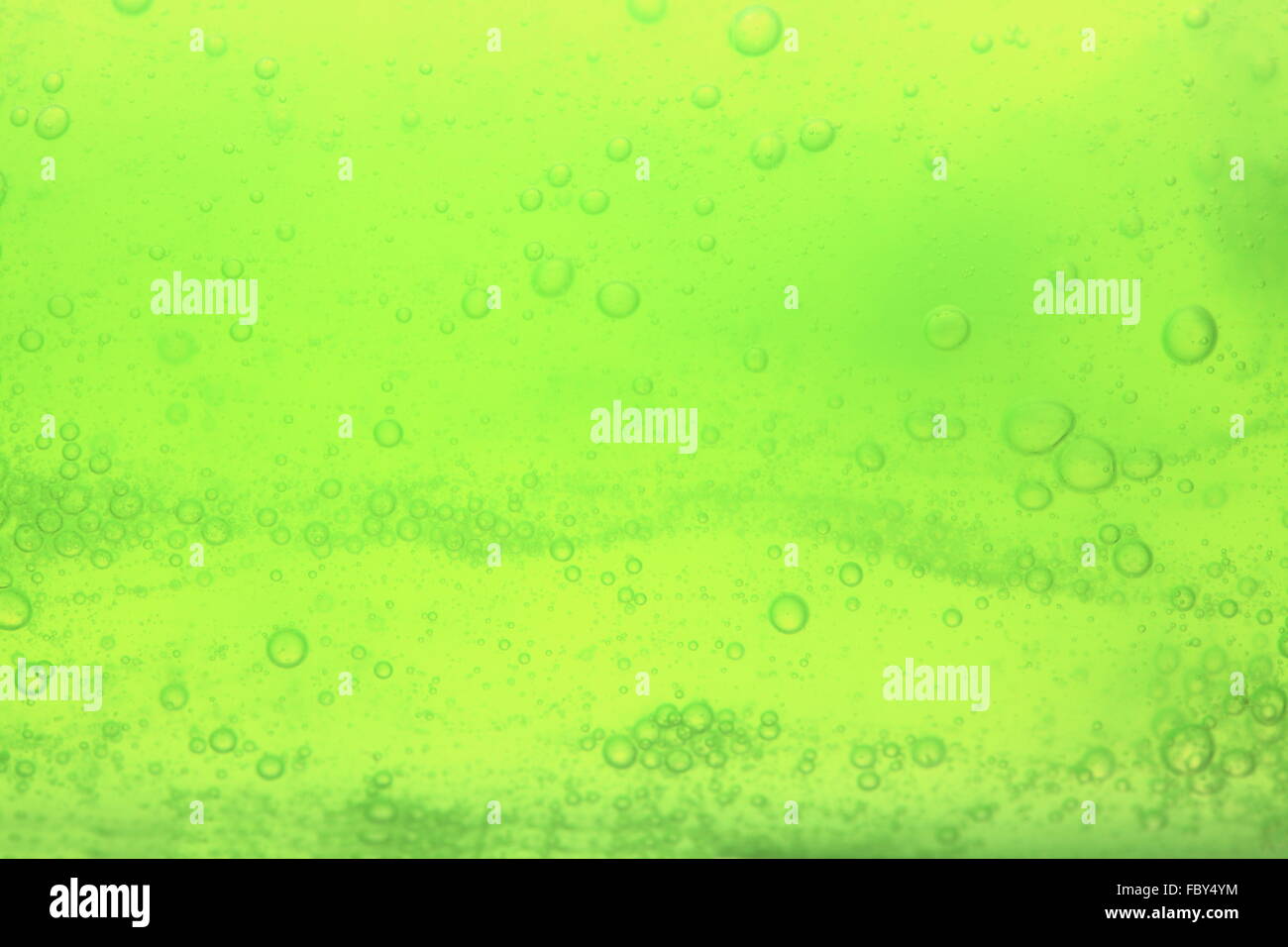 soap bubbles green liquid background Stock Photo - Alamy