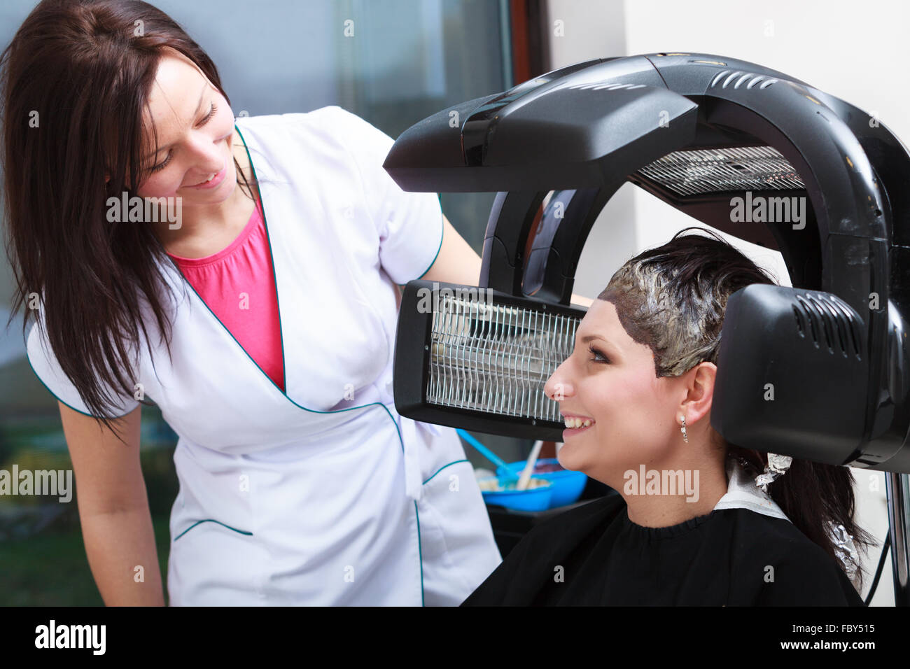 Hairdresser talking woman client in hi-res stock photography and images ...