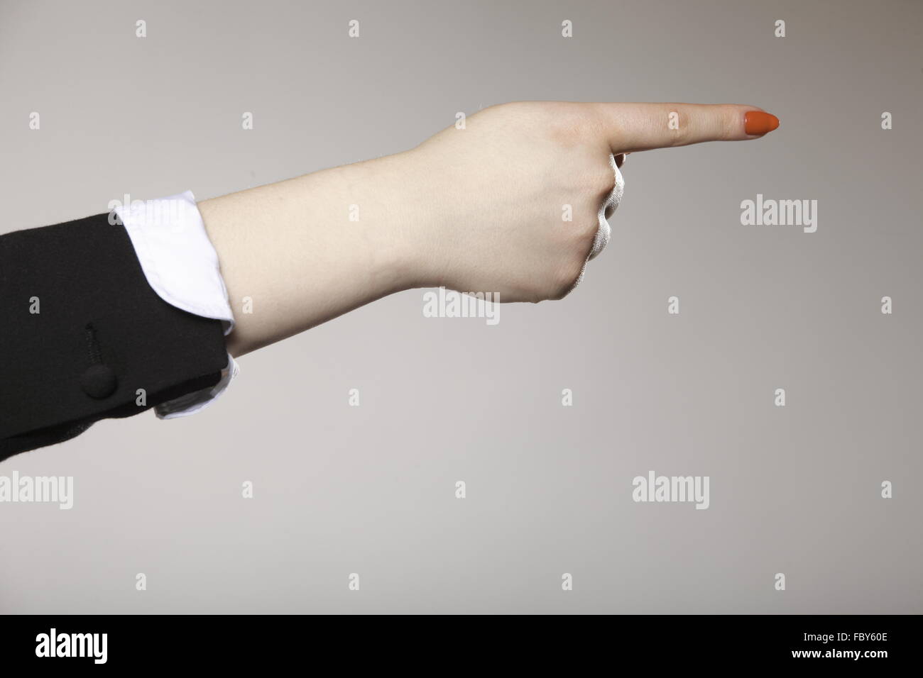 Woman hand pointing direction with index finger Stock Photo - Alamy