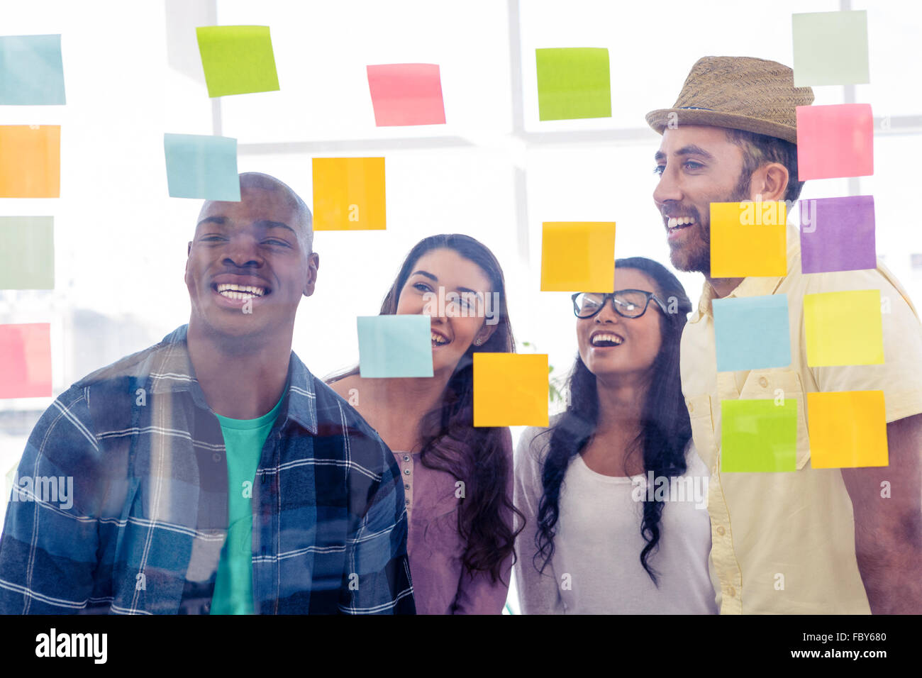 Standing smiling communication paper hi-res stock photography and ...