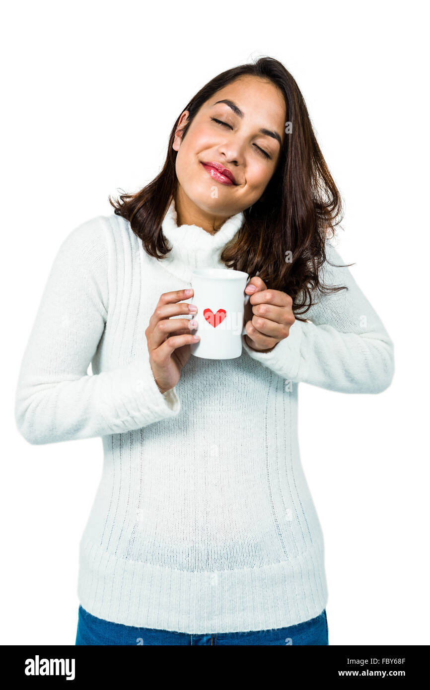 Beautiful woman holding coffee mug Stock Photo - Alamy